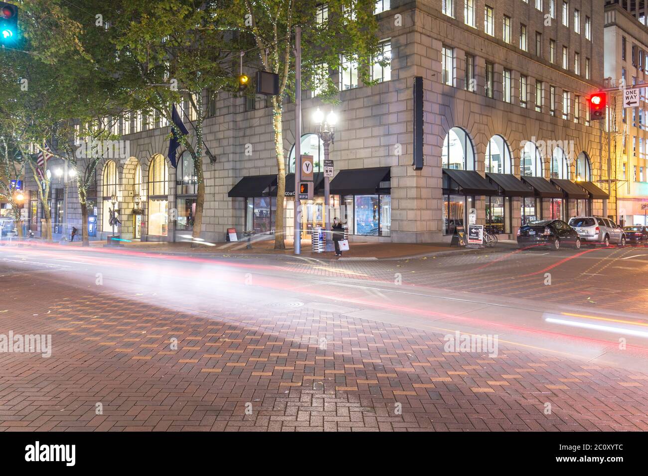 intersection of brick road and modern building Stock Photo - Alamy