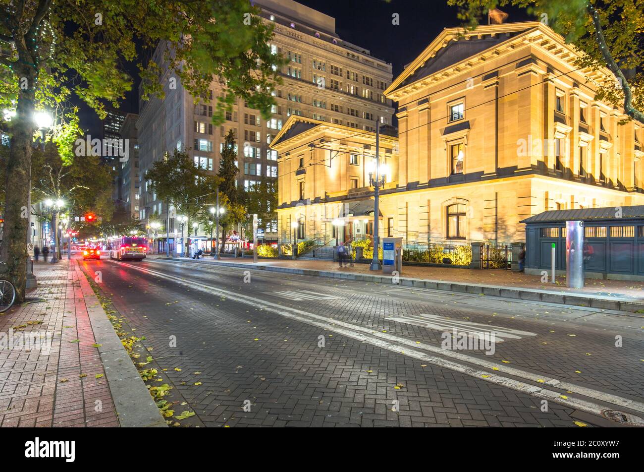 intersection of brick road and modern building Stock Photo - Alamy