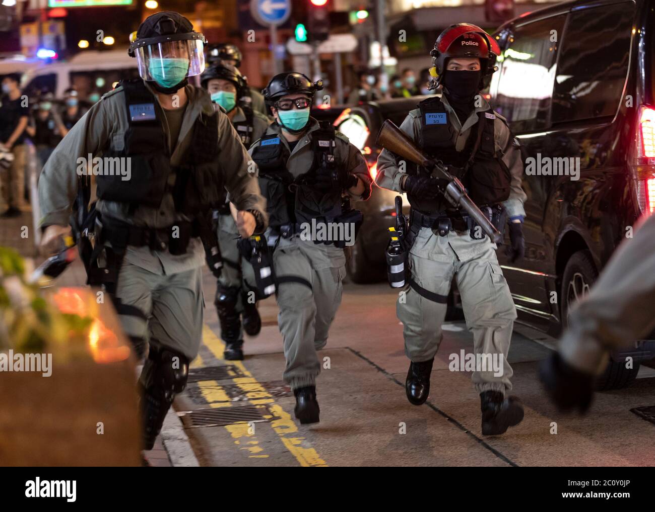 Riot police chase hi-res stock photography and images - Alamy