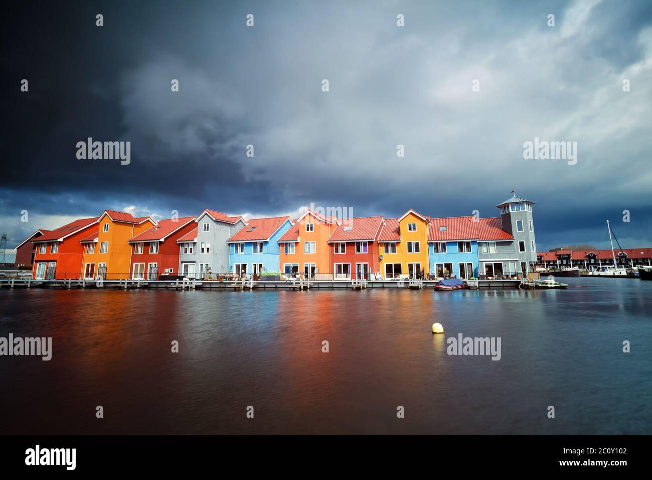beautiful colorful buildings on water at storm Stock Photo - Alamy
