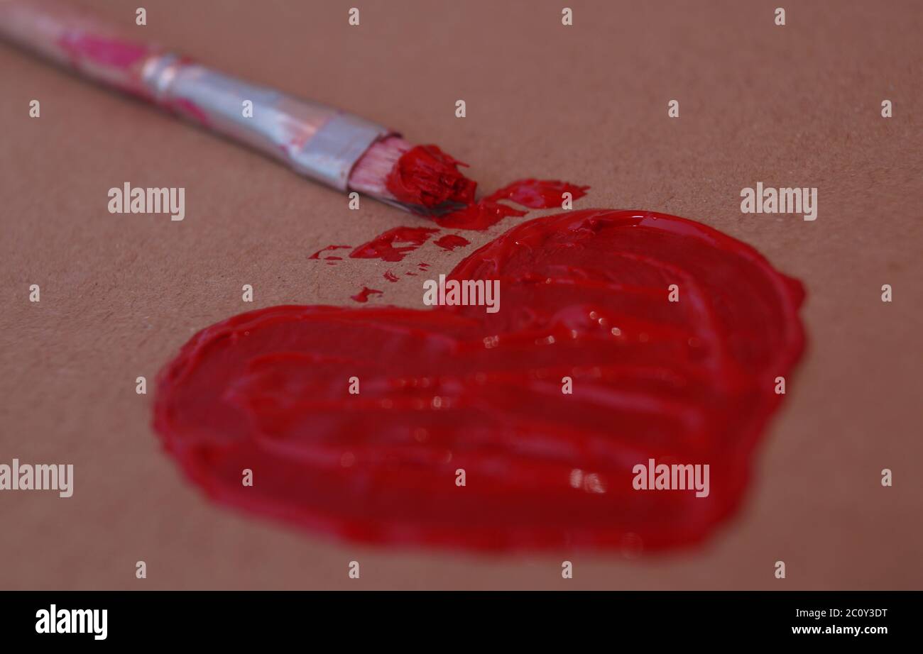 close up of a red acrylic heart drawing with brush painting wood Stock ...
