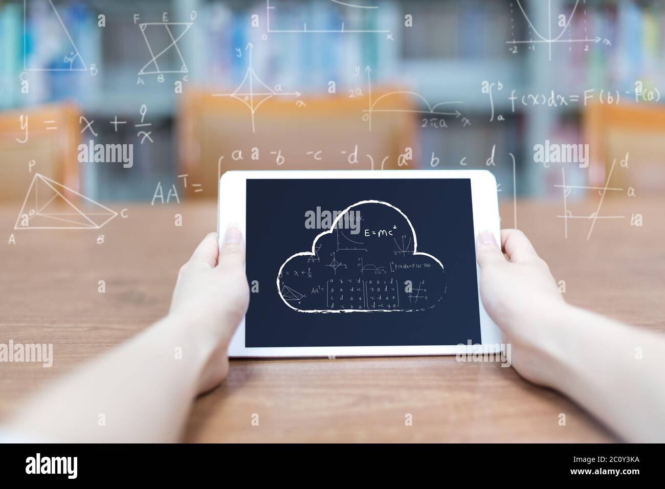 first view of tablet with data cloud in hands on background Stock Photo ...