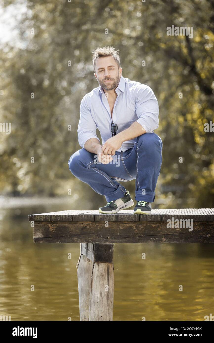 man at the lake Stock Photo - Alamy