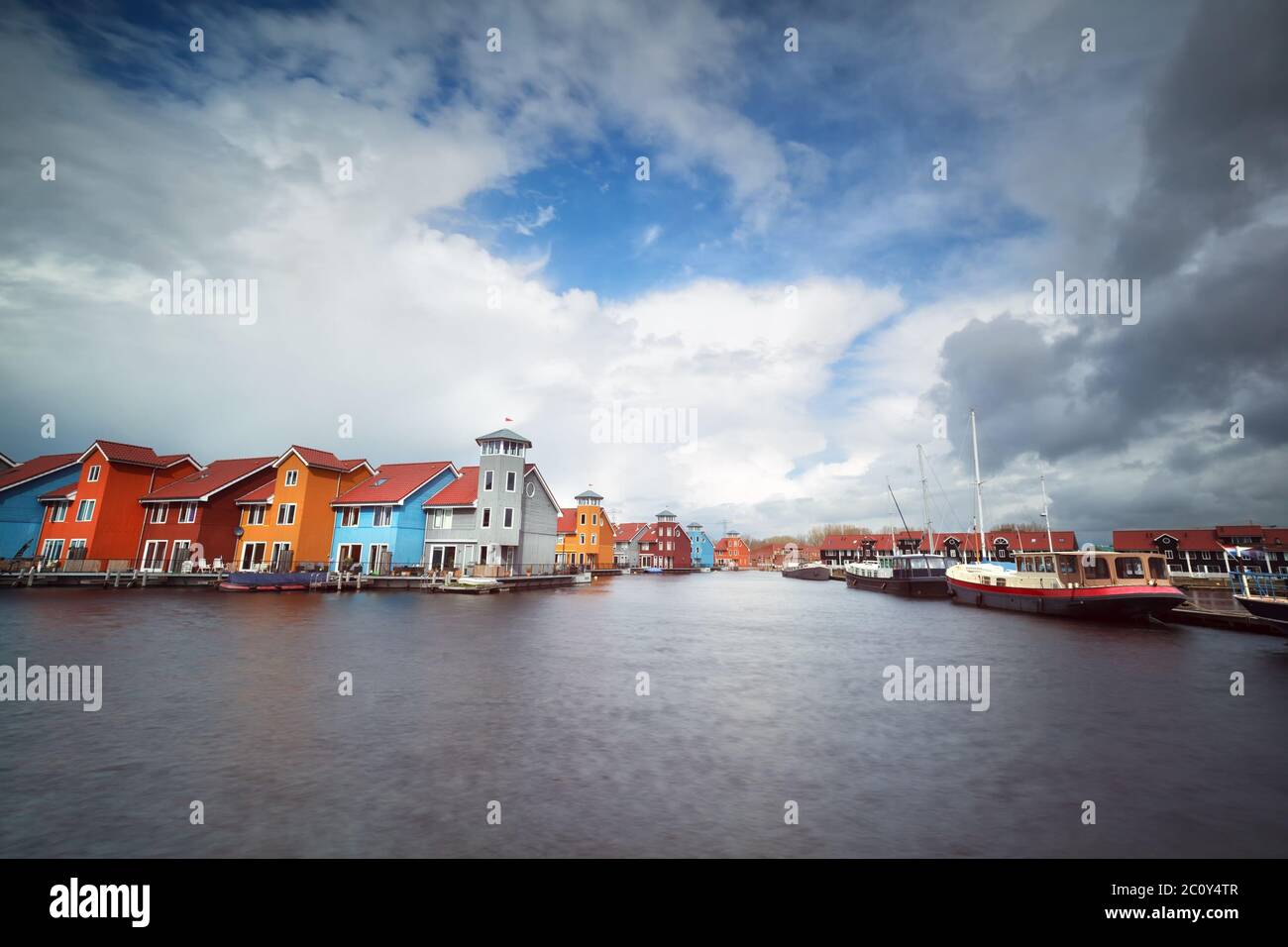 colorful buildings on water, yach and boats Stock Photo - Alamy