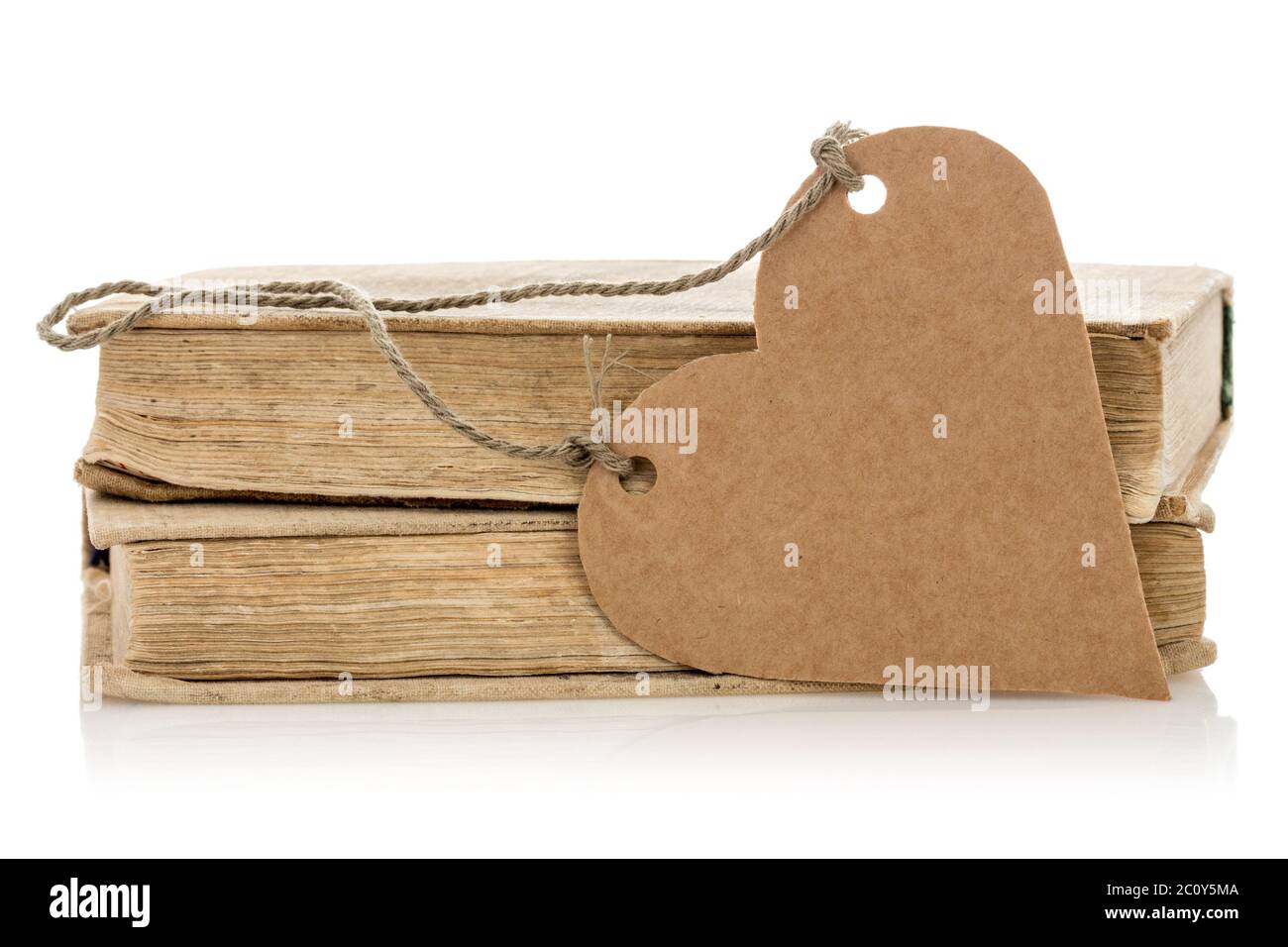 Books with heart shaped tag Stock Photo - Alamy
