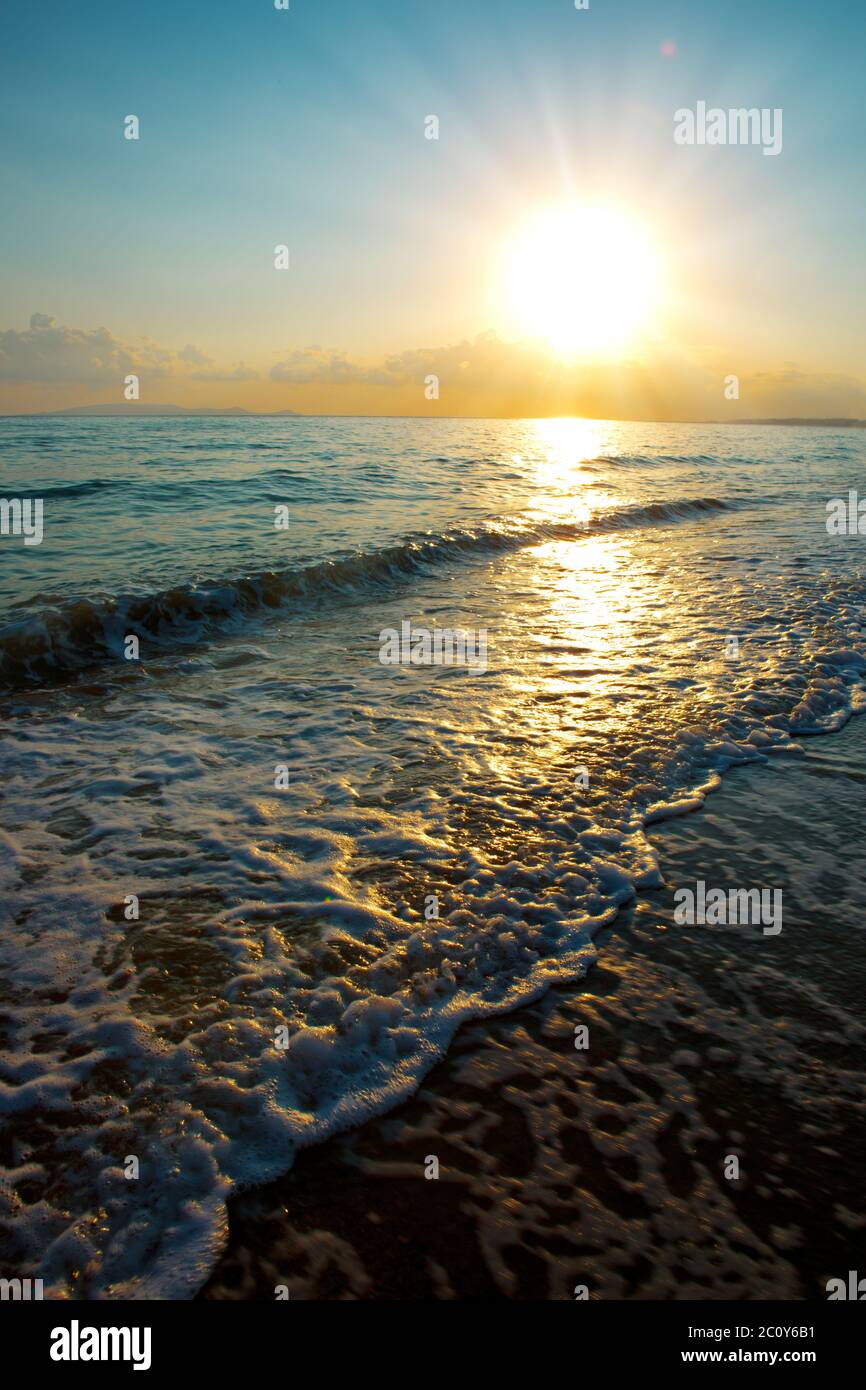 Sunset over the sea Stock Photo - Alamy