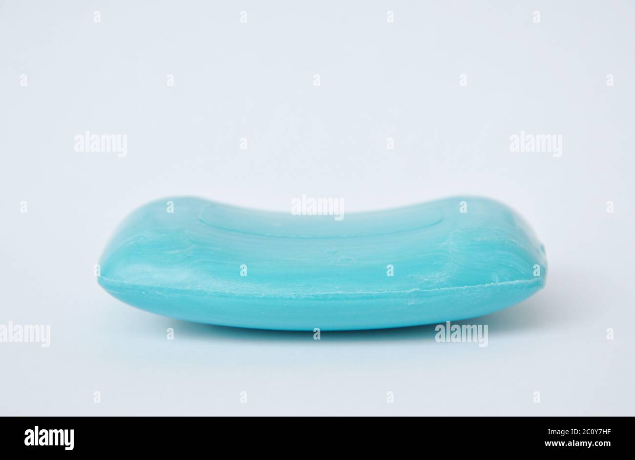 blue soap bar on white background Stock Photo - Alamy
