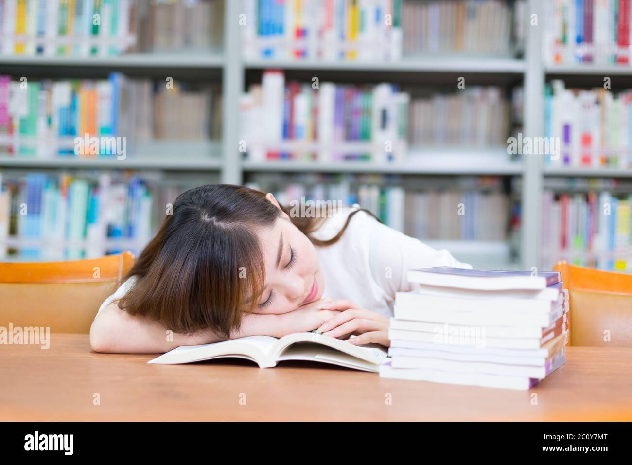 young beautiful asian girl in school library Stock Photo - Alamy