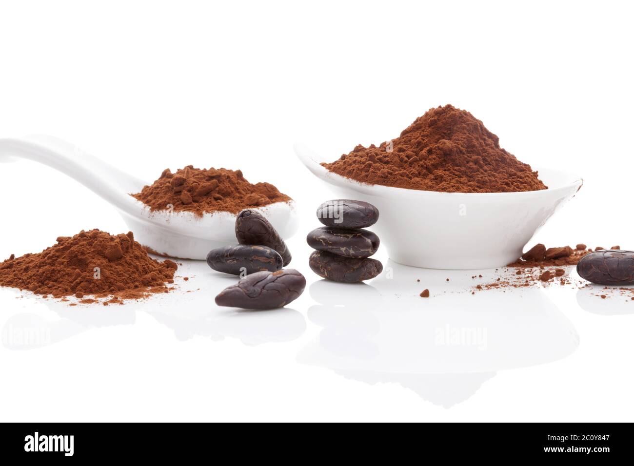 Fresh cocoa beans spoon Cut Out Stock Images & Pictures - Alamy