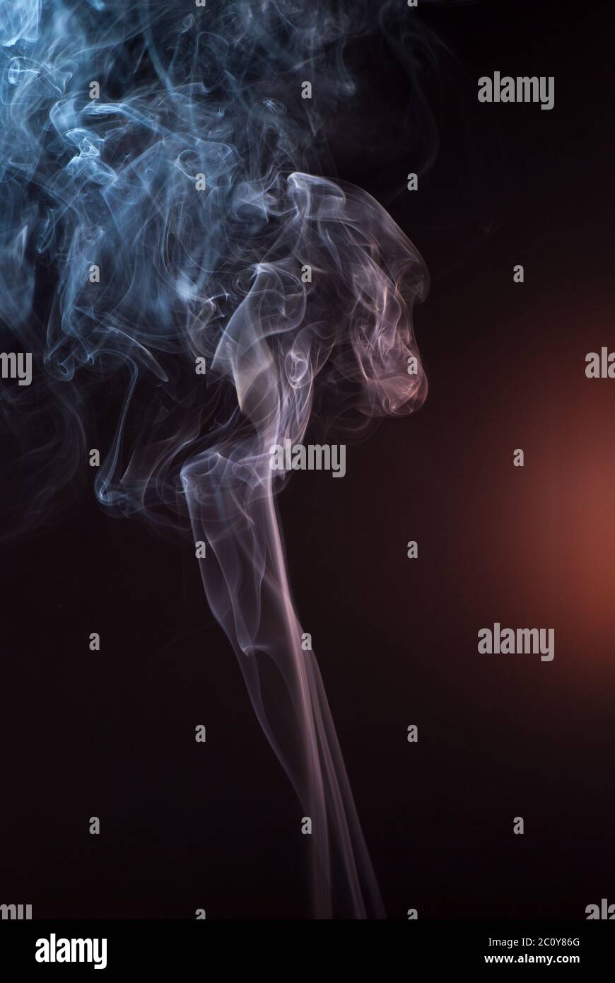 Beautiful smoke on the black background - macro photo Stock Photo - Alamy