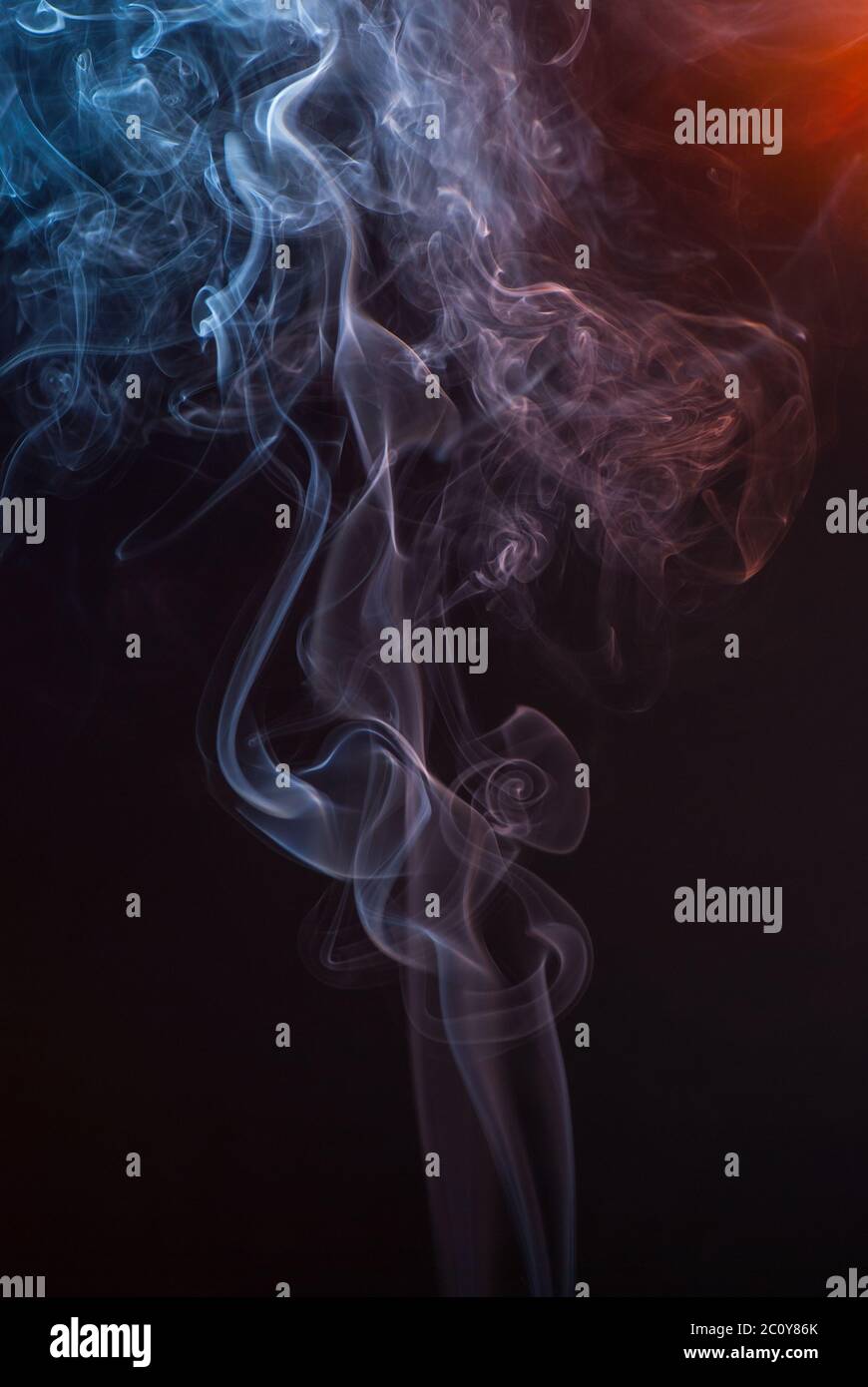 Beautiful smoke on the black background - macro photo Stock Photo - Alamy