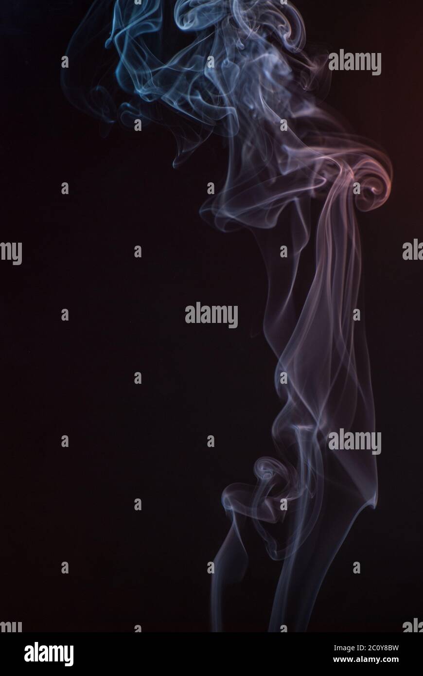 Beautiful smoke on the black background - macro photo Stock Photo - Alamy