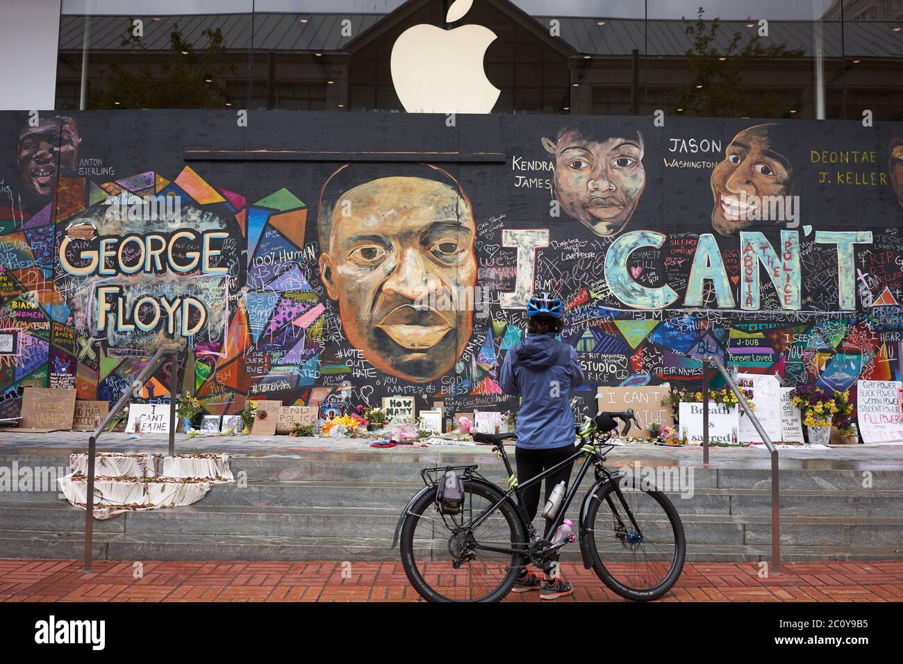 The boarded-up Apple Store in downtown Portland's Pioneer Place, which ...