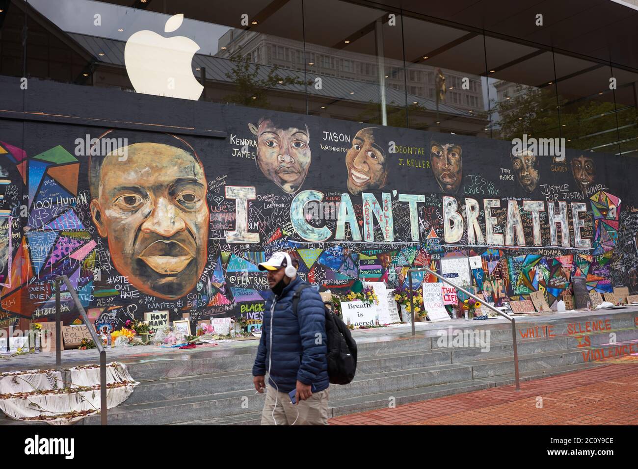 The boarded-up Apple Store in downtown Portland's Pioneer Place, which ...