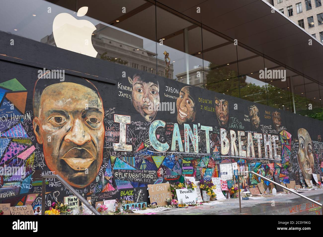 The boarded-up Apple Store in downtown Portland's Pioneer Place, which ...