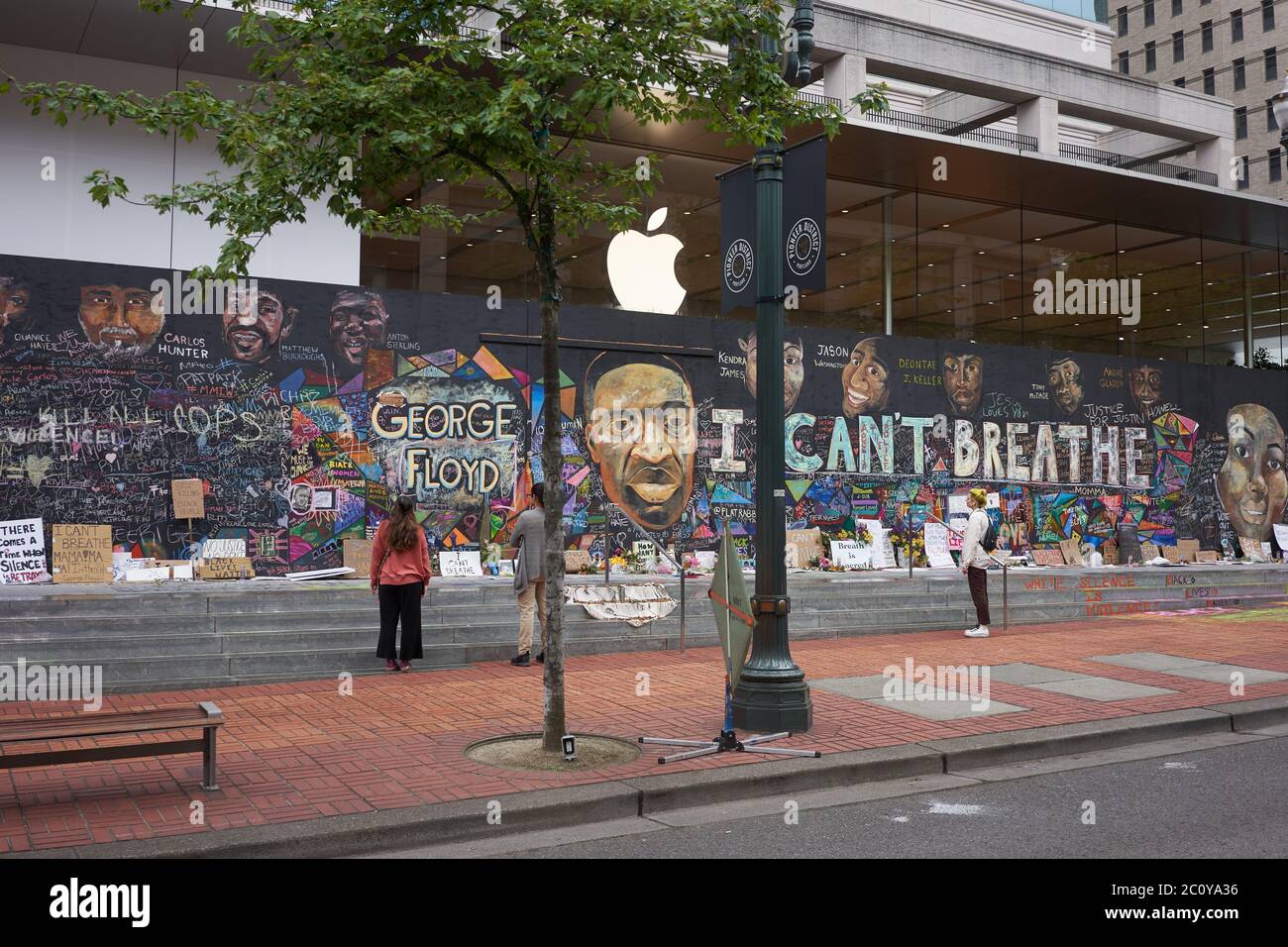 The boarded-up Apple Store in downtown Portland's Pioneer Place, which ...