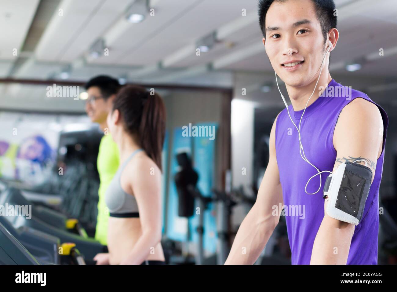 young asian people working out in modern gym Stock Photo - Alamy