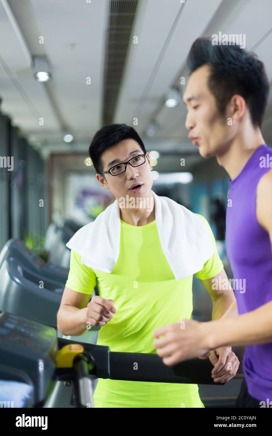 young asian people working out in modern gym Stock Photo - Alamy