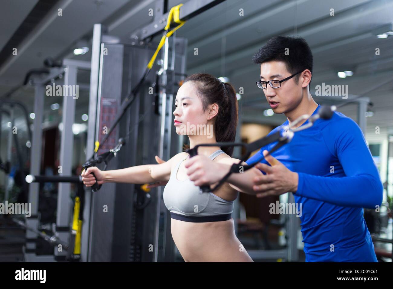 young asian people working out in modern gym Stock Photo - Alamy