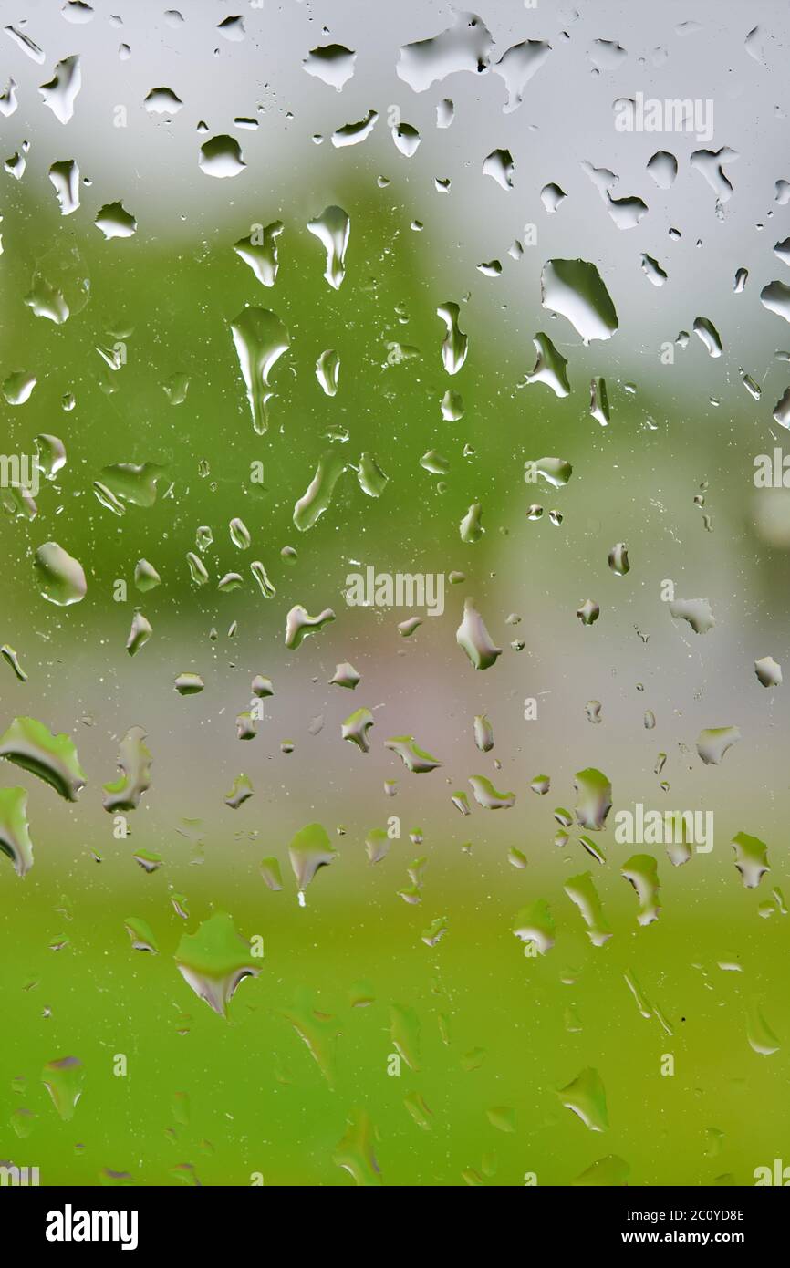Raindrops on a window pane Stock Photo - Alamy