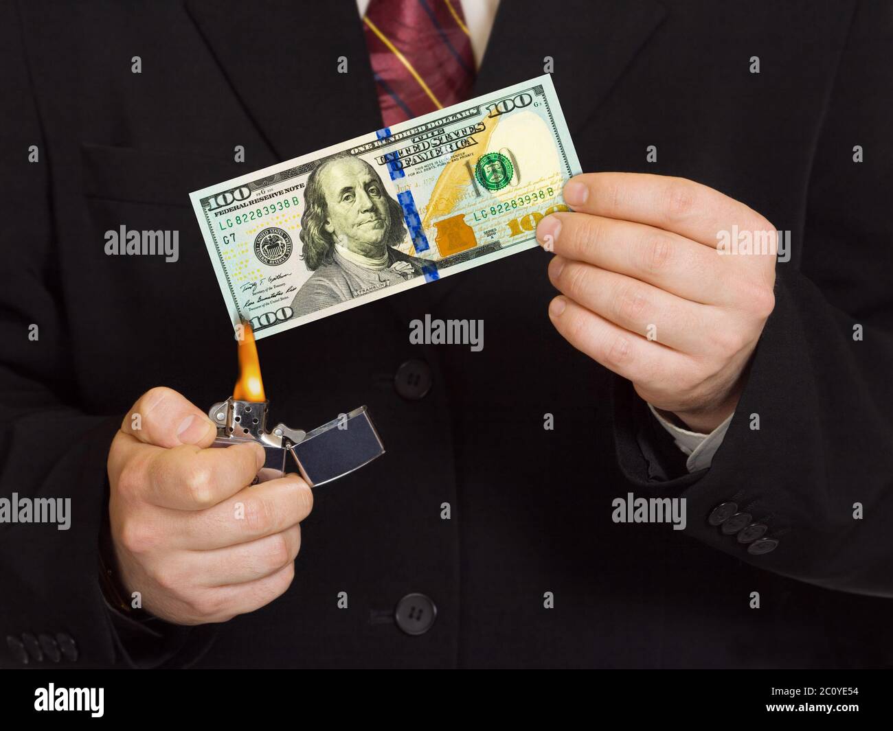 Burn money with lighter hi-res stock photography and images - Alamy