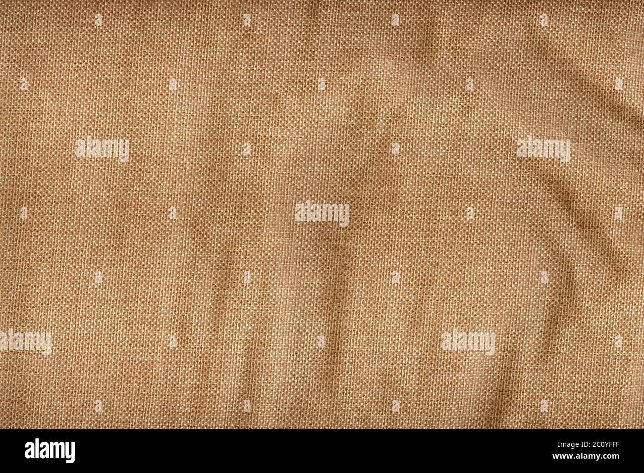Beige linen fabric texture. A detailed shot of a beautiful natural ...
