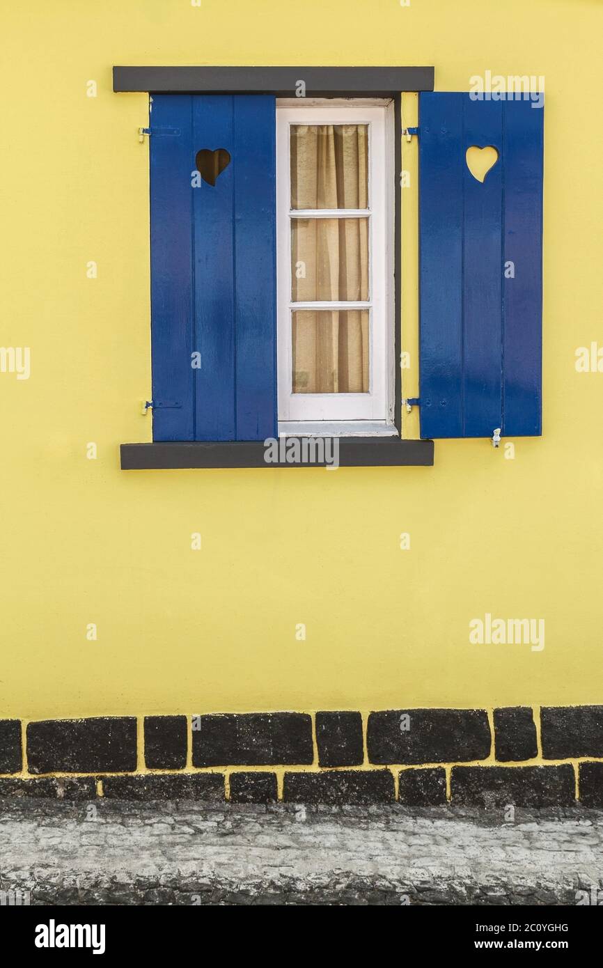 Blue yellow window hi-res stock photography and images - Alamy