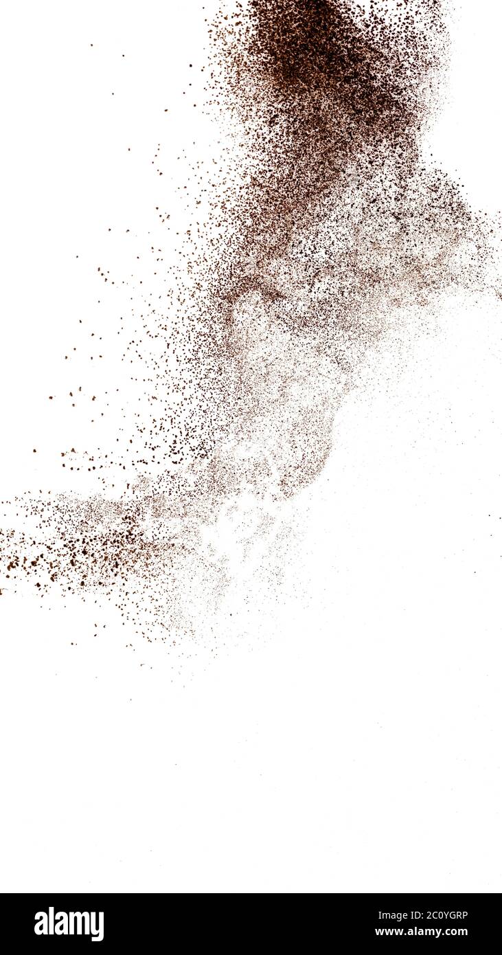 Deep brown powder dust explosion and falling down against white ...