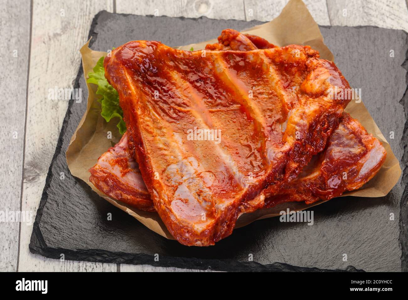 Raw marinated pork ribs ready for cooking Stock Photo - Alamy