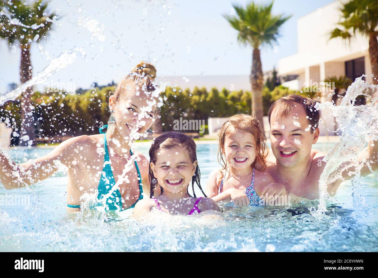 Kids having fun in pool hi-res stock photography and images - Alamy