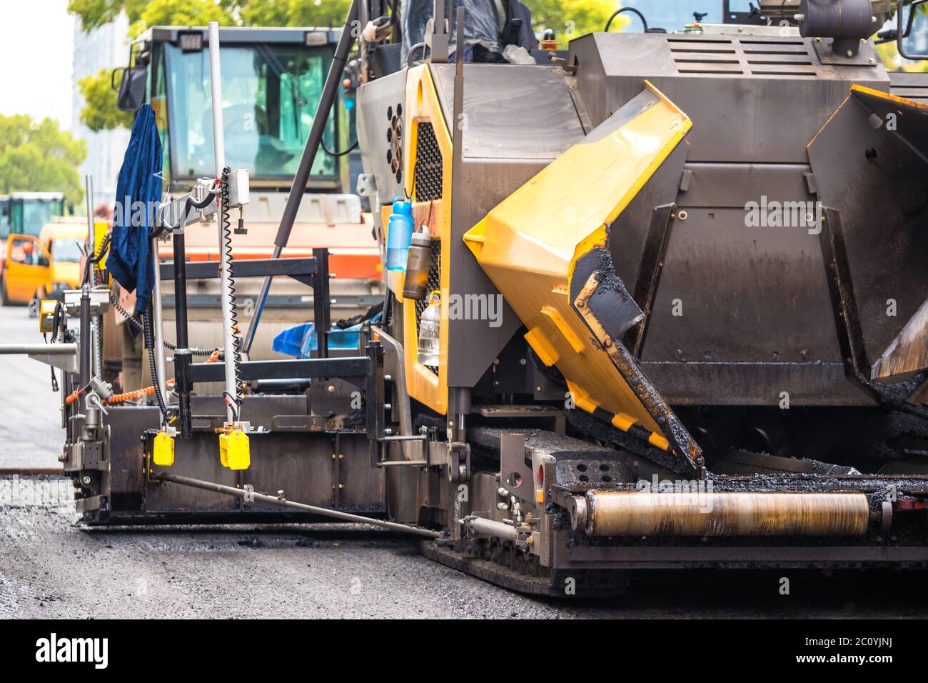 asphalt pavement roller on road Stock Photo - Alamy