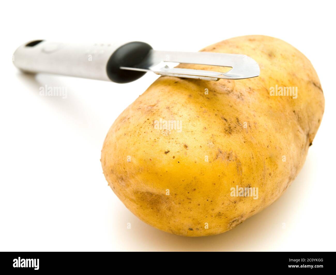 Potato with Knife Stock Photo - Alamy