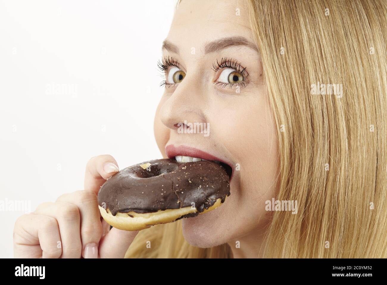 Eating donut hi-res stock photography and images - Alamy