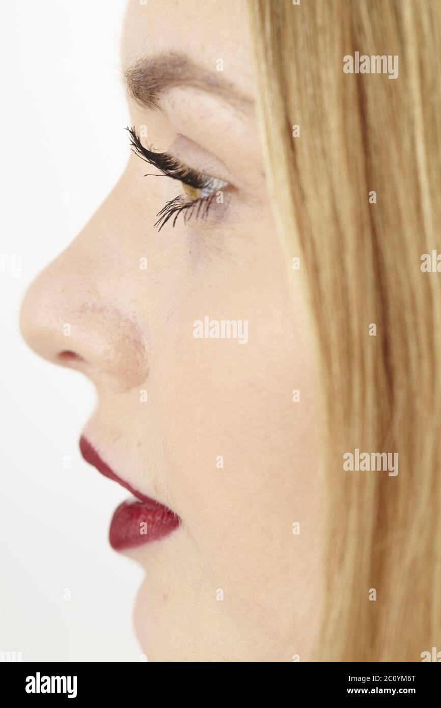 Red painted lips of a blonde young woman Stock Photo - Alamy