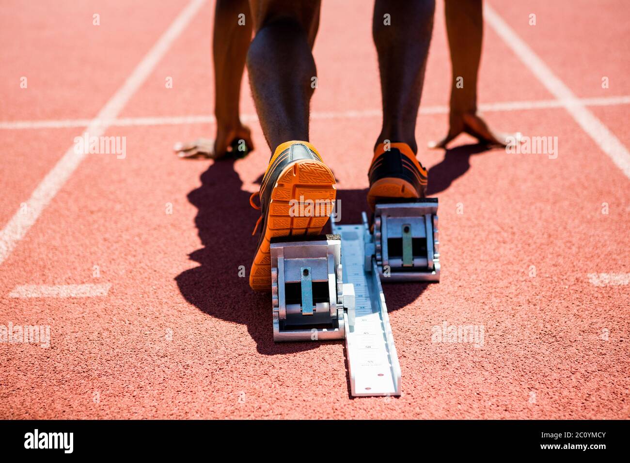 Athlete focused starting block hi-res stock photography and images - Alamy