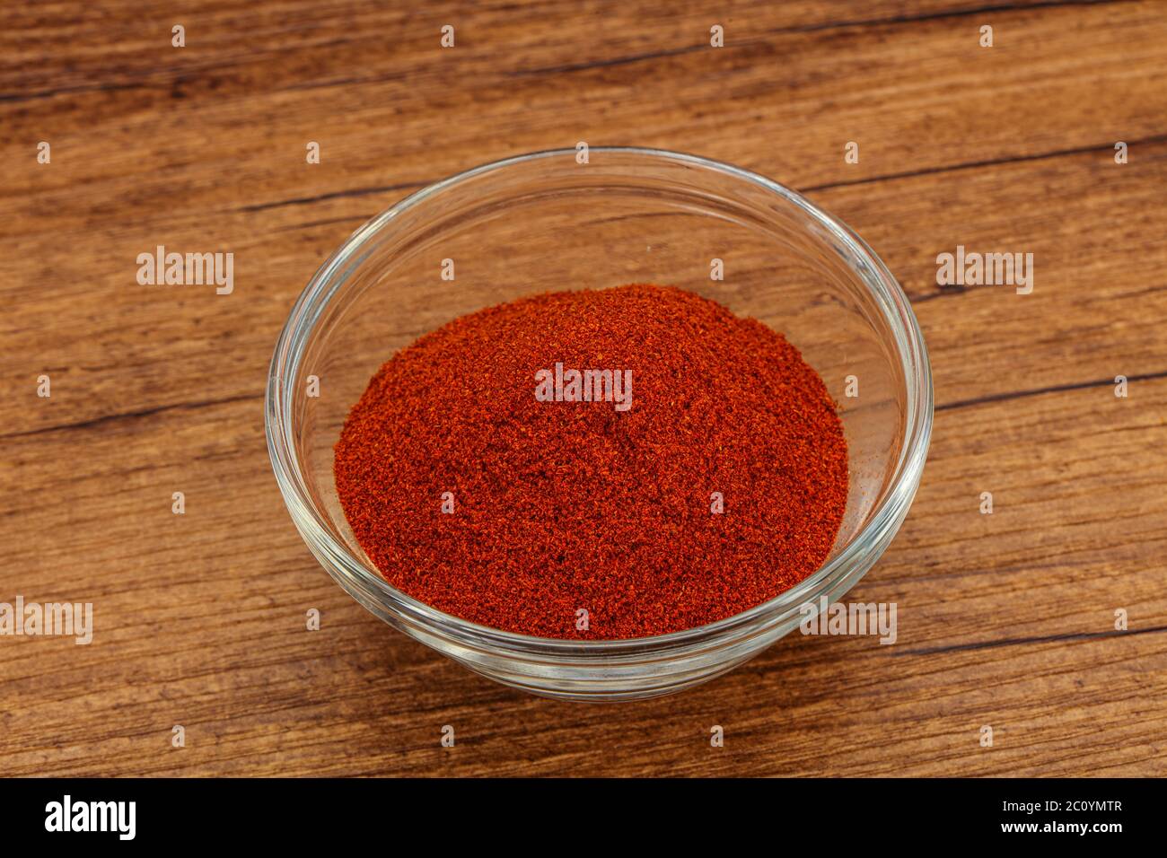 Dry paprika powder in the bowl for cooking Stock Photo - Alamy