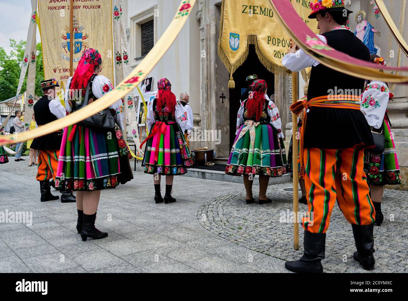 Lowicz, Poland - June 11 2020: An unidentified polish people wearing ...