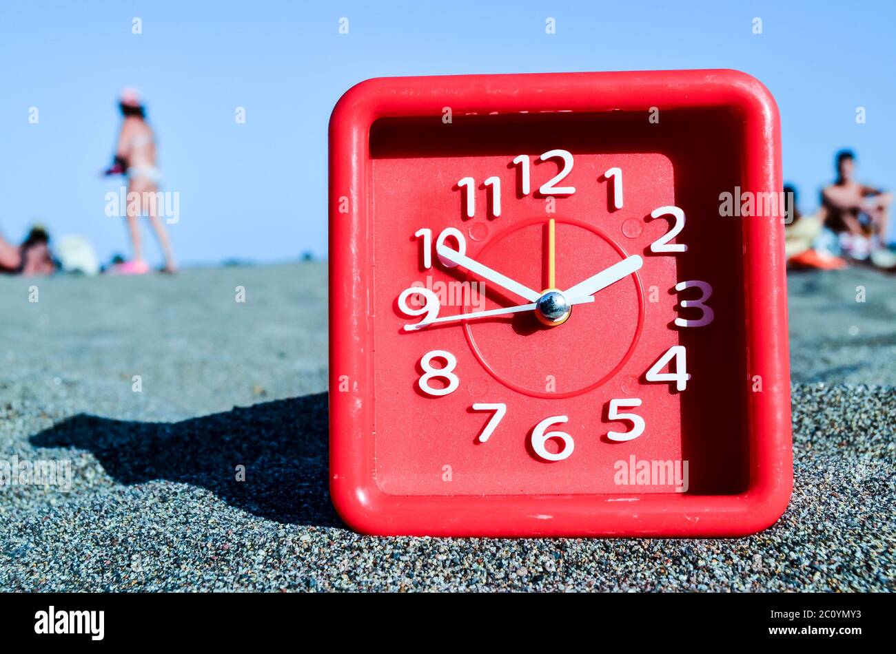 Clock on the Sand Beach Stock Photo - Alamy