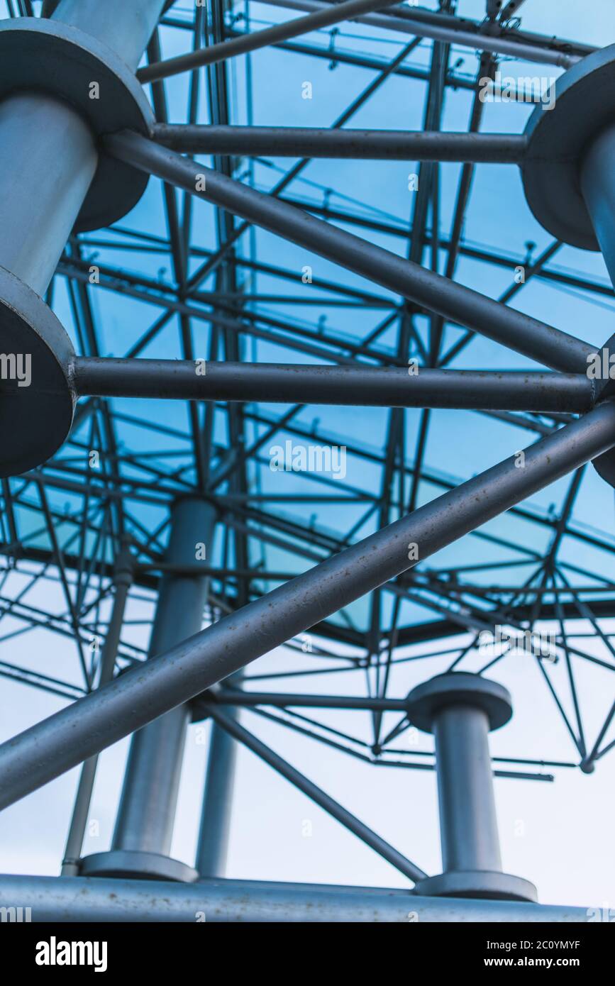 Bottom view of modern glass roof in business district in evening Stock ...
