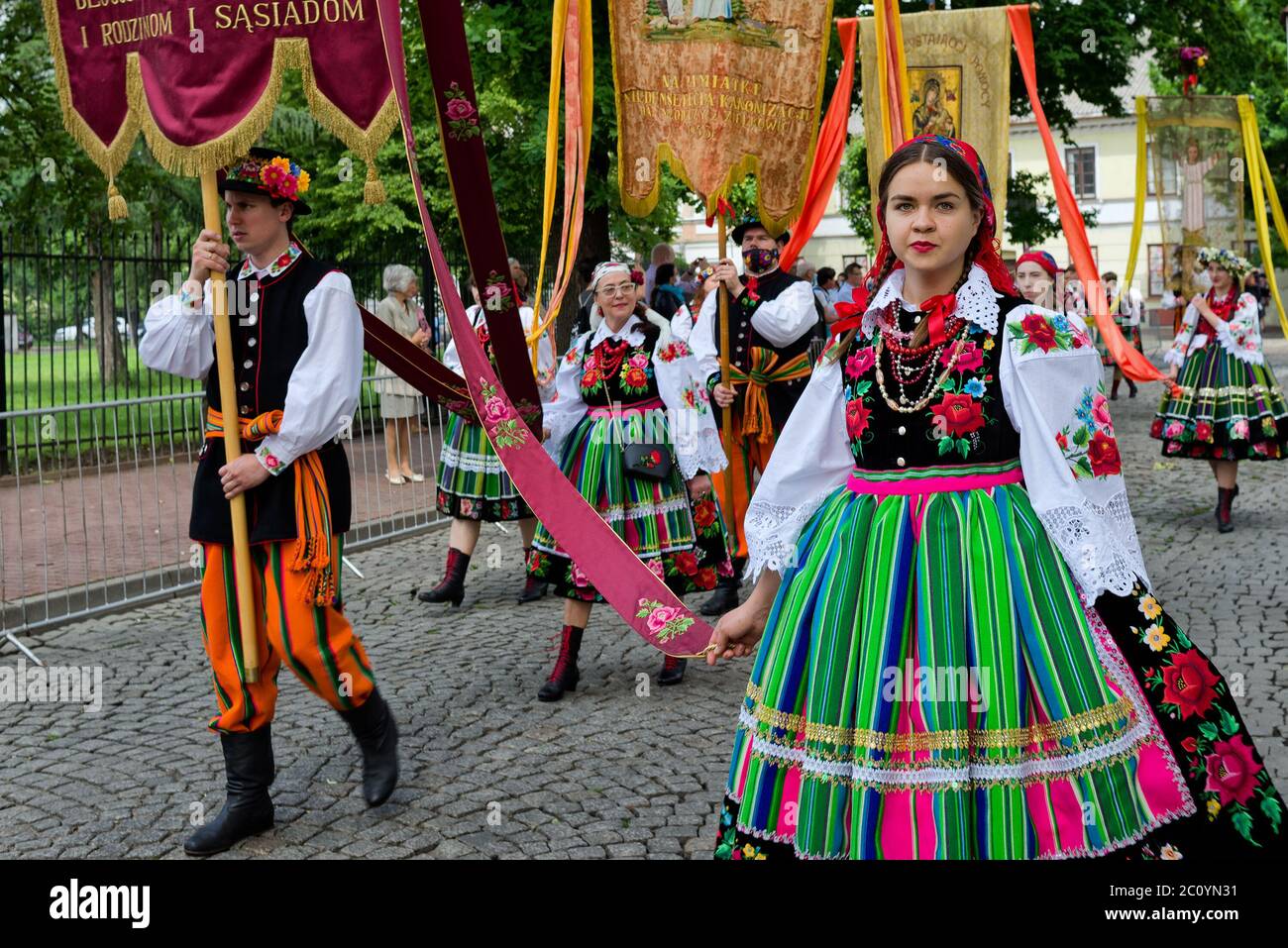 Lowicz, Poland - June 11 2020: An unidentified polish people wearing ...