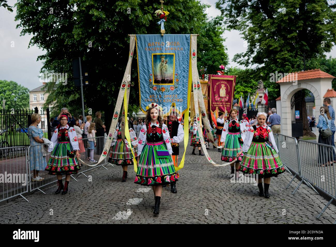 Lowicz, Poland - June 11 2020: An unidentified polish people wearing ...