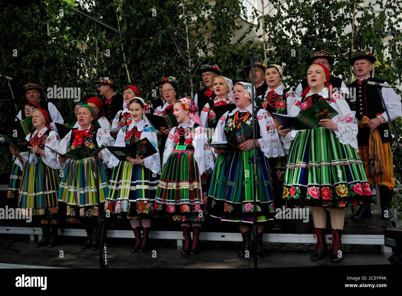 Lowicz, Poland - June 11 2020: An unidentified polish people wearing ...