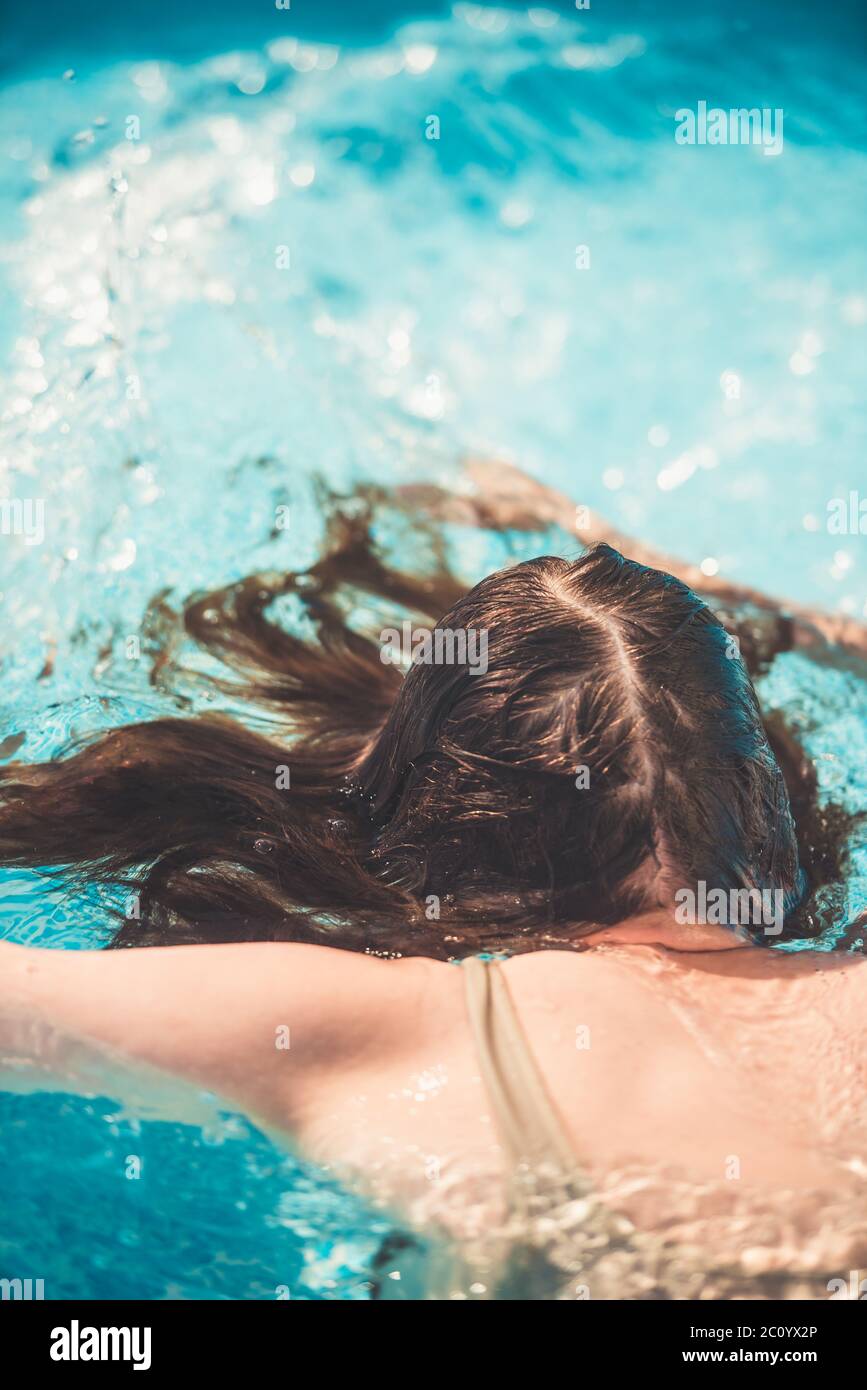 Rear view girl in bikini hi-res stock photography and images - Alamy