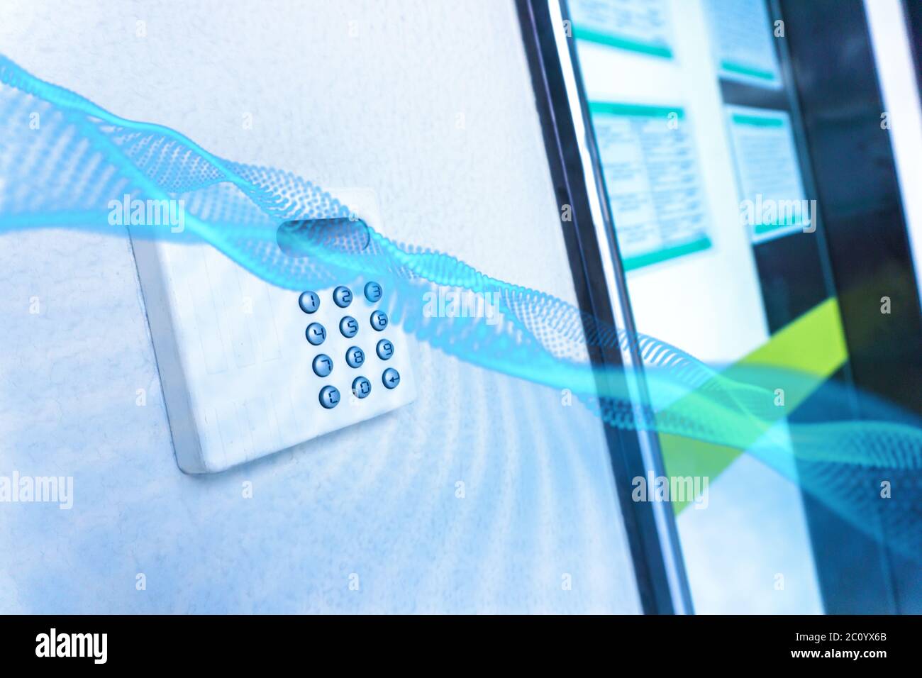 modern hi-tech door key on wall Stock Photo - Alamy