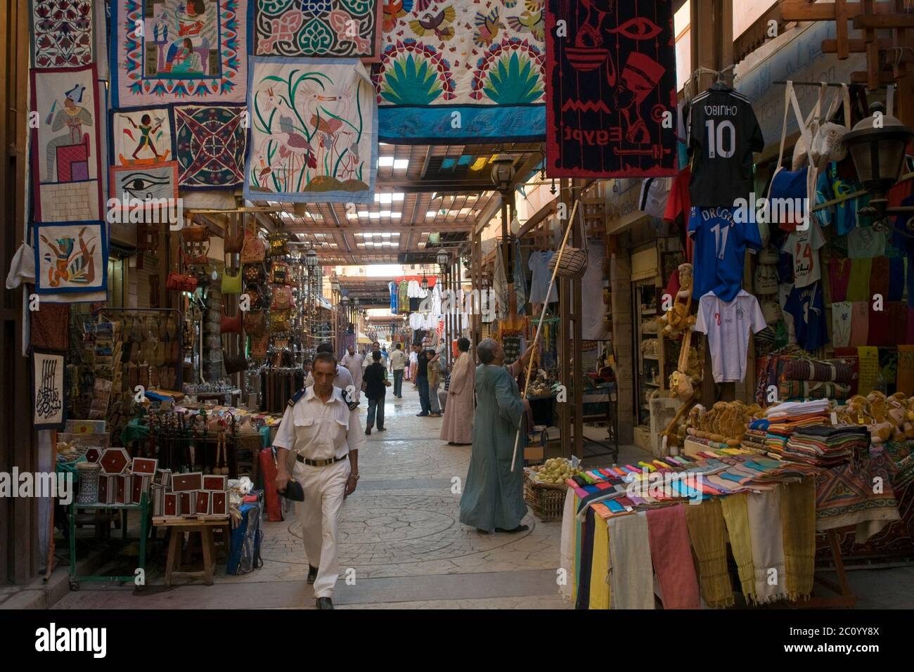 People walk through El Souk open air market in Luxor Egypt Stock Photo ...