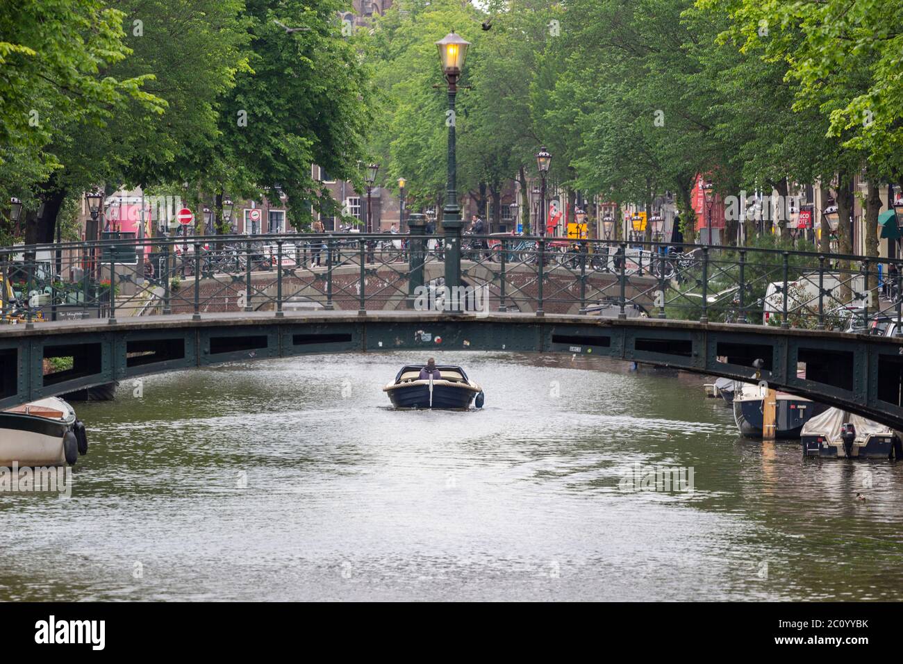 Boating in canals of Amsterdam,Netherlands Stock Photo - Alamy