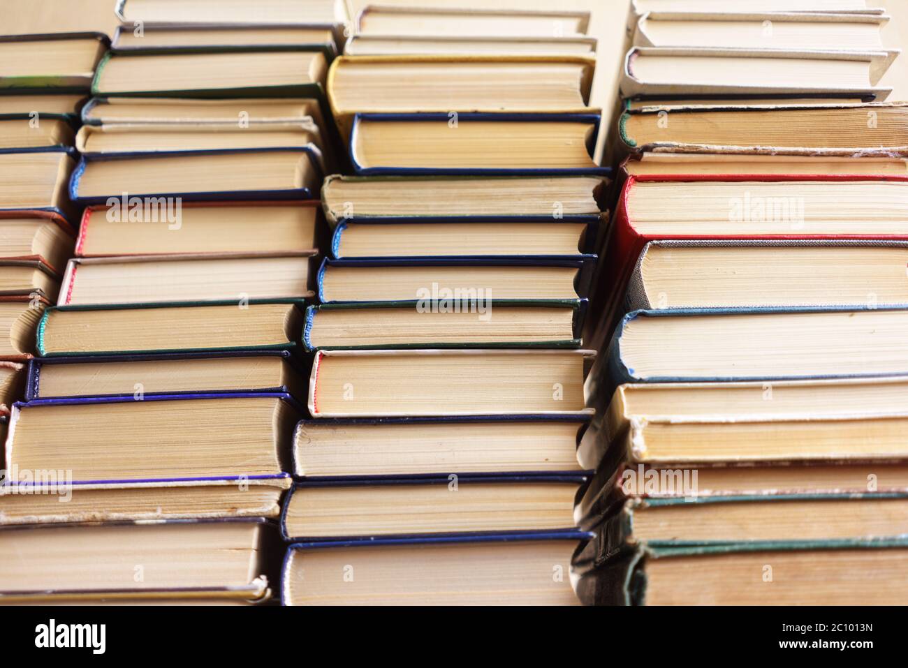 Big book piles hi-res stock photography and images - Alamy