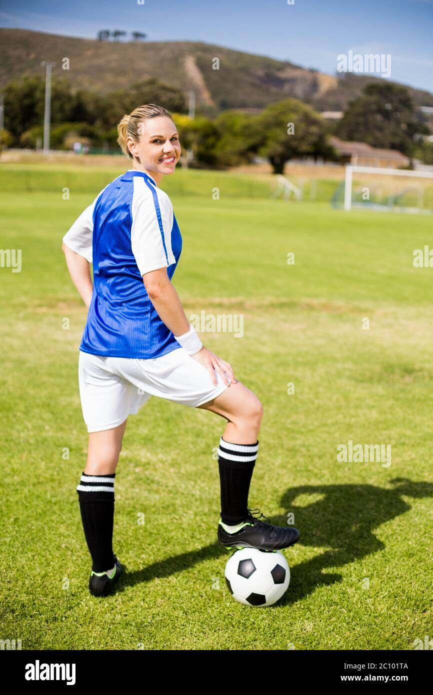 Soccer football player standing feet hi-res stock photography and ...