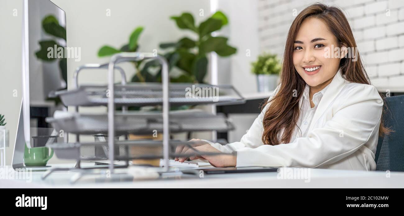 Banner of Asian business woman working and typing keyboard of ...