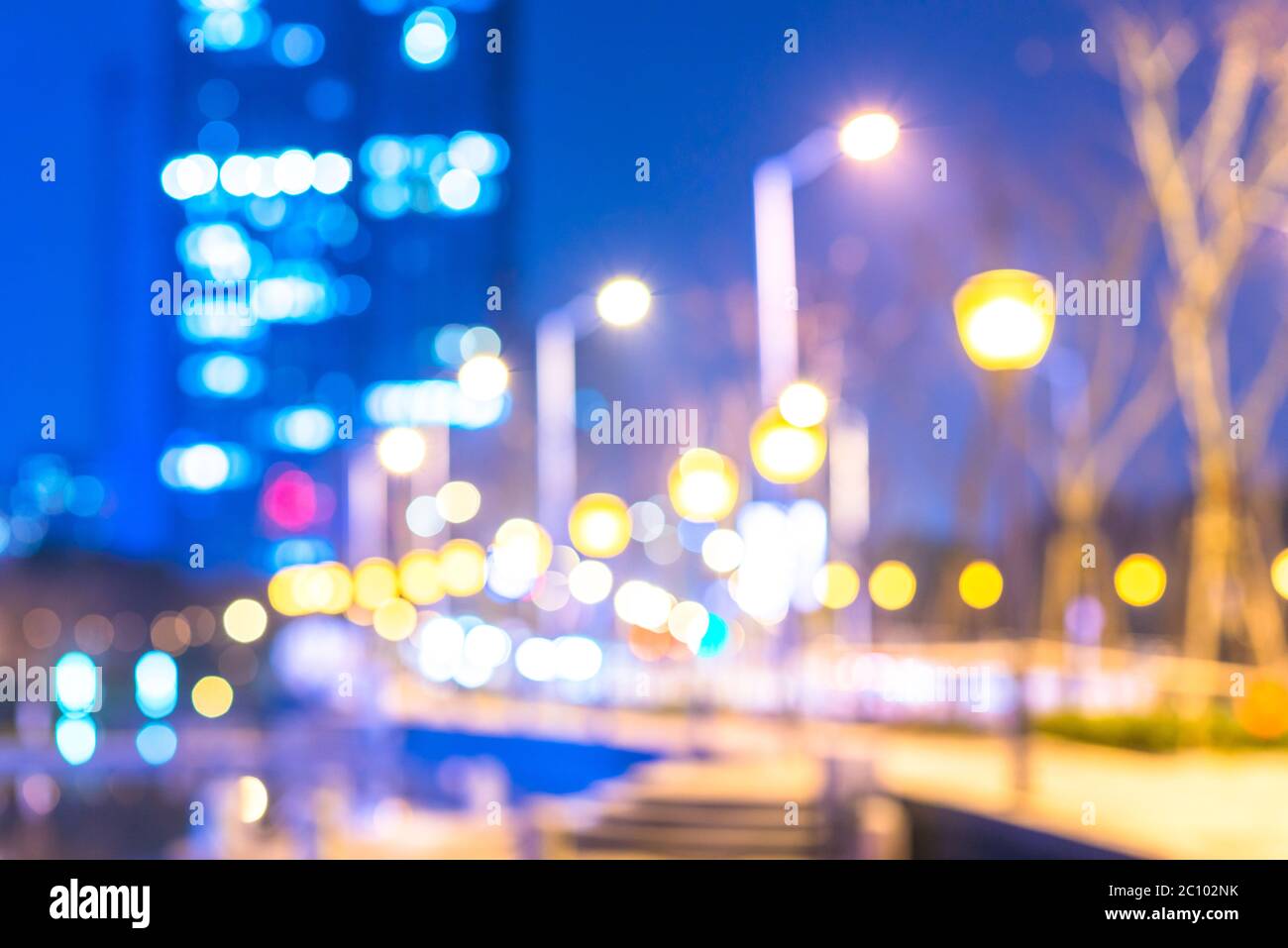 blur night scene on street in modern city Stock Photo - Alamy